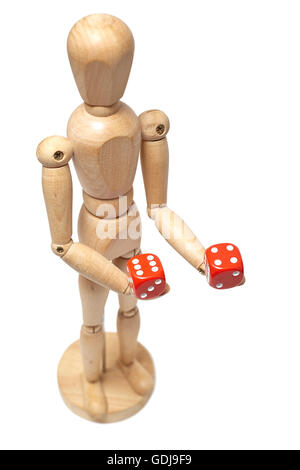 Wooden puppet holds dice on white background with clipping path Stock ...
