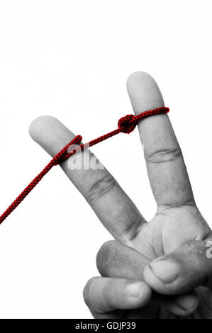 Two fingers being tied together by a rope to represent the unity Stock ...