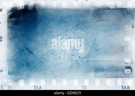 Film negative frames on blue background Stock Photo - Alamy