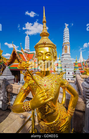 Golden Thai Kinnari Sculpture at the Grand Palace showing a buddhist ...