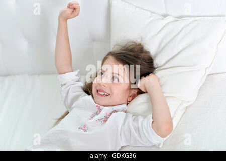 Adorable little girl awaked Stock Photo - Alamy