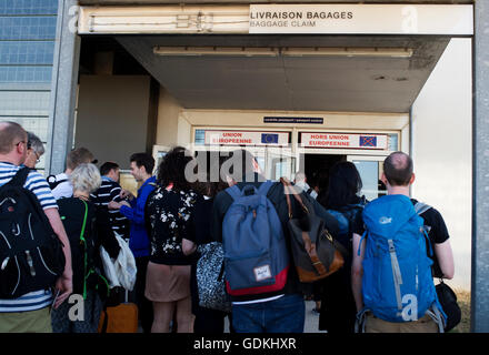 Waiting to go through French passport control, with one door for ...