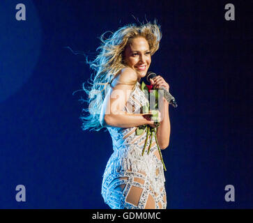 J-Lo performing on stage at Dubai World Cup 2014 concert in Meydan ...