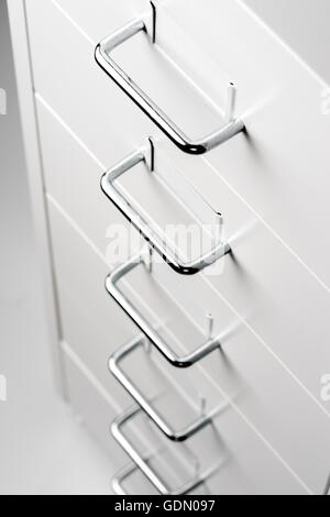 Close-up of a white metal cabinet labelled Earthquake Emergency ...