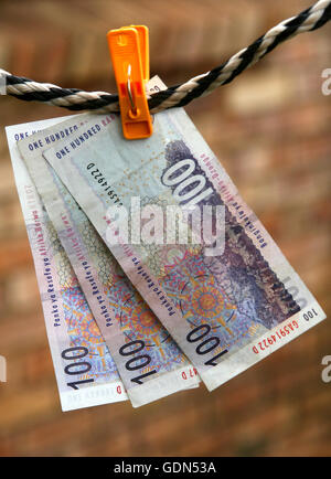 100 Rand notes on the washing line, South Africa Stock Photo - Alamy