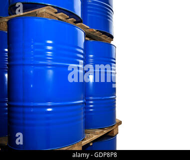 Blue and white oil barrel container drums in junk yard Stock Photo - Alamy