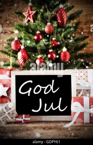 nostalgic tree,snowflakes,god jul merry christmas means Stock Photo - Alamy