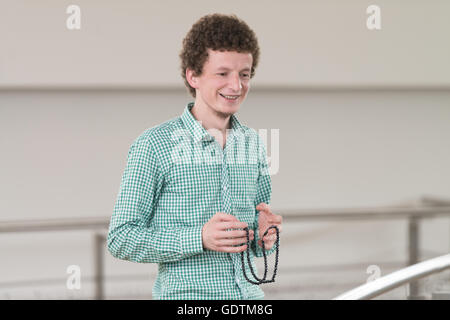Portrait Of A White Muslim Man With Afro Lock Hair Curly Is Praying In ...