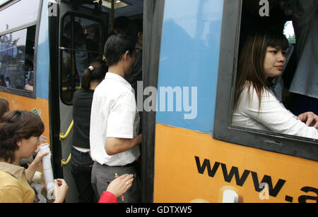 Overcrowded bus in Beijing Stock Photo - Alamy