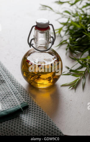 Herb oil with tarragon (Artemisia dracunculus) (Artemisia dranunculus ...