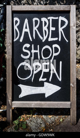 Barbershop open sign Stock Photo - Alamy