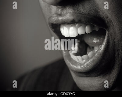 Closeup of man screaming or yelling with a wide mouth Stock Photo - Alamy