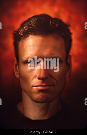 handsome man glaring at the camera Stock Photo - Alamy