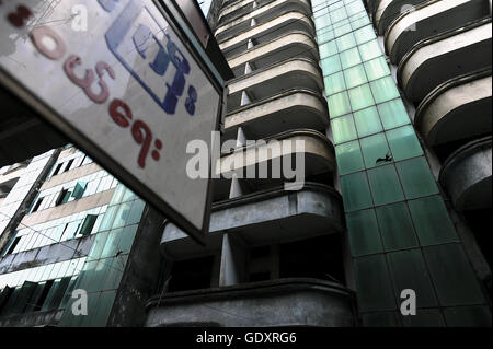 MYANMAR. Yangon. 2014. Abandoned high-rise building Stock Photo - Alamy