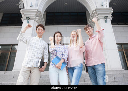 Four smiling global college students face to face Stock Photo - Alamy