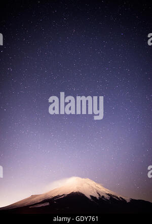 Mount Fuji under a starry sky viewed from the Fuji View Hotel ...