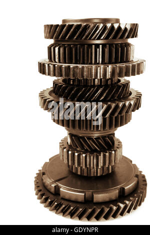 Steel cogs together on plain background Stock Photo - Alamy
