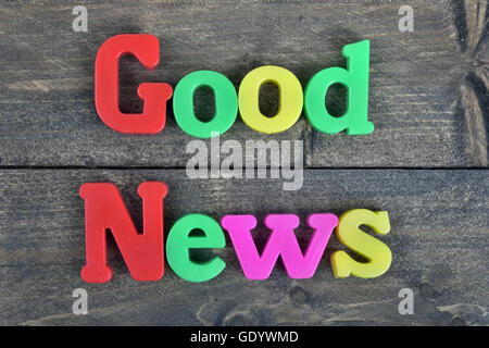 Good News word on wooden table Stock Photo - Alamy