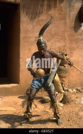 A Somba man in northern Benin near Naitatingo, performing a hunting ...