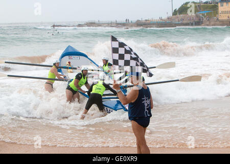 Traditional surf boat racing in the Ocean thunder race series at Dee ...