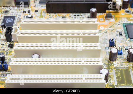 PCI connector slot in motherboard PC toned macro Stock Photo - Alamy