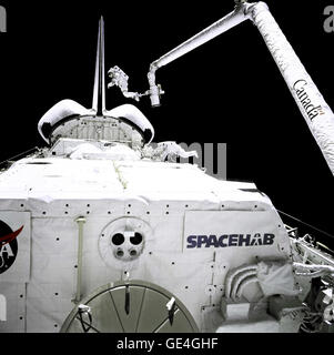 Astronauts G. David Low and Peter Wisoff conducted an extravehicular ...