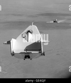 The M2-F1, a wingless lifting body aircraft, is towed at NASA’s Flight ...
