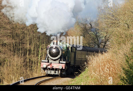 Modified hall class locomotive 6960, Ravingham Hall, pulling a train ...