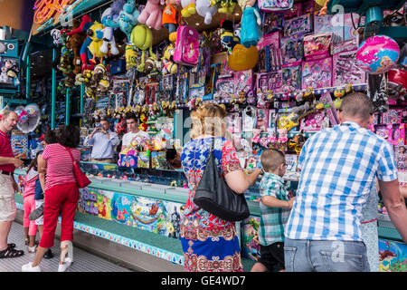 Hook a duck fairground game Stock Photo - Alamy