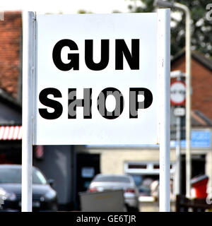 Gun shop sign Stock Photo - Alamy