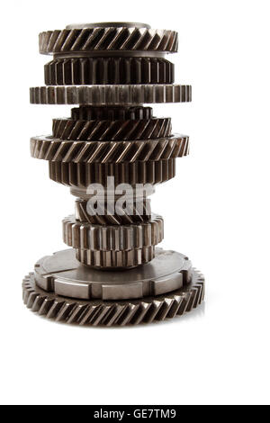 Steel cogs together on plain background Stock Photo - Alamy