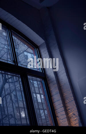 Low angle view of modern residential building under construction with ...