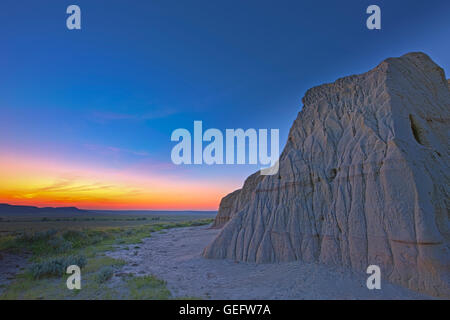 Formations of Castle Butte during dusk in Big Muddy Badlands, Southern ...