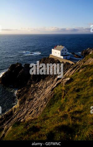 Lighthouse Krakenes on rocky coast of Atlantic ocean Stock Photo - Alamy
