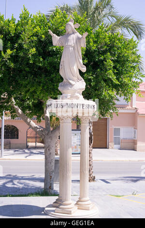 A small statue of Jesus Christ on the Cross Stock Photo - Alamy