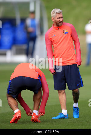Barcelona's Lionel Messi (right) during the training session at St ...