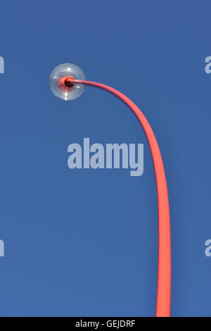 Iconic red wind wand kinetic sculpture on seafront promenade in New ...