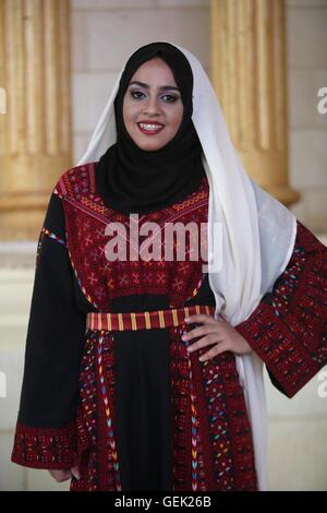 Jenin. 25th July, 2016. A Palestinian model displays a traditional ...
