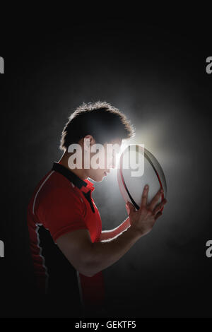 Portrait of Japanese rugby player with ball Stock Photo - Alamy