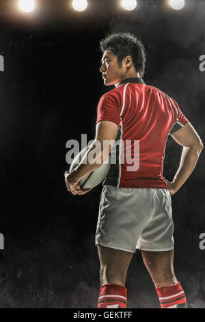 Portrait of Japanese rugby player with ball Stock Photo - Alamy