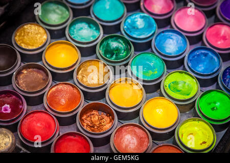 Colorful paint tubes on a table with paints used for face art Stock ...