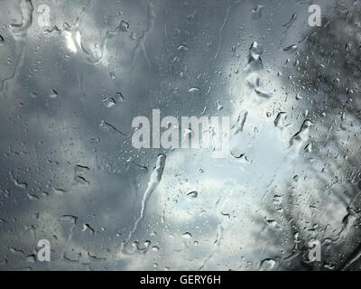 Auto windshield during rain storm Stock Photo - Alamy