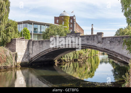A view of the River Wensum with reflections in Spring downstream of the ...