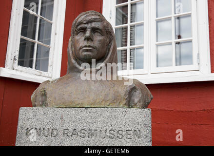 Greenland, Ilulissat. A statue outside a museum dedicated to Knud ...