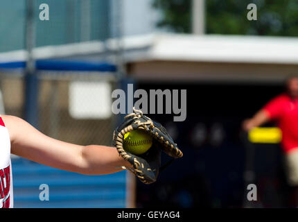 Female baseball player catching the ball during a baseball game Stock ...