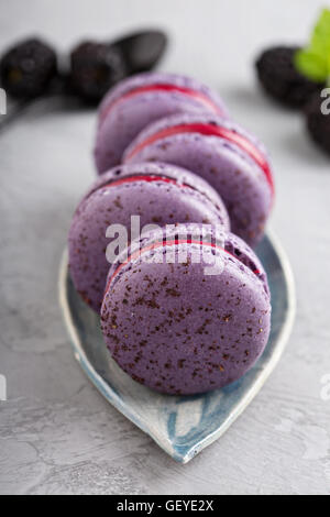 Assorted cakes on wooden table background Stock Photo - Alamy