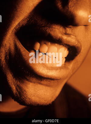 Closeup of a man cringing his teeth in disgust Stock Photo - Alamy