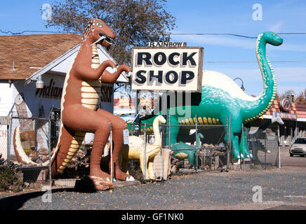 Colorful dinosaur statues guard a classic rock shop along old Route 66 ...