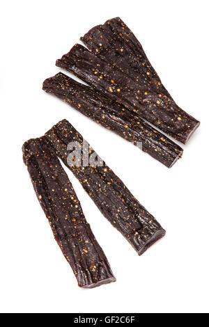 Beef Biltong sticks isolated on a white studio background Stock Photo ...