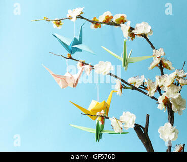 colorful animal origami on branches of paper tree Stock Photo - Alamy